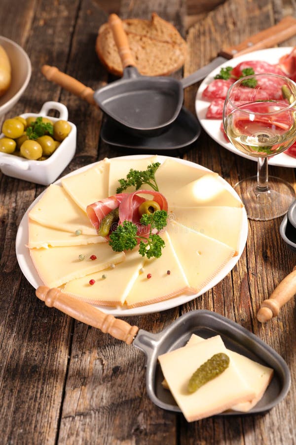 Raclette Pans with Food, Ideal for Party Stock Photo - Image of melting ...