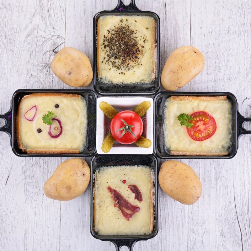 Raclette tray stock image. Image of dish, cheese, dinner - 35693675