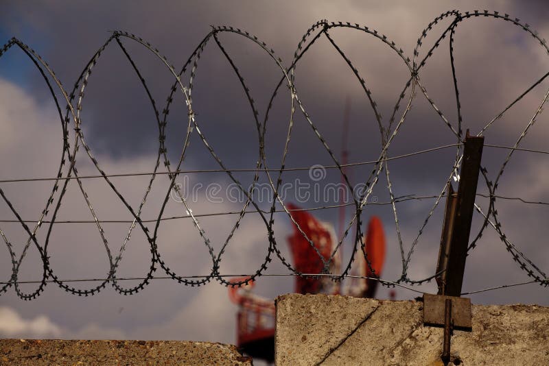 Radar behind barbed wire stock photo. Image of radar - 24433416