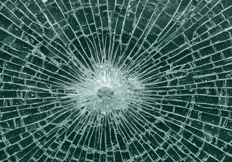 Radial, Spiderweb-like Pattern on Shattered Glass. the Break Extends ...