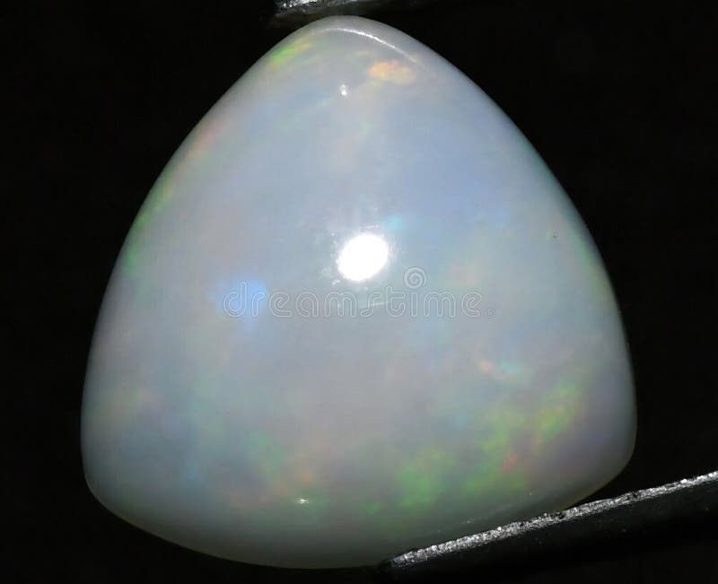 Radiant Opal Gemstone with Iridescent Hues and Smooth Finish Stock ...
