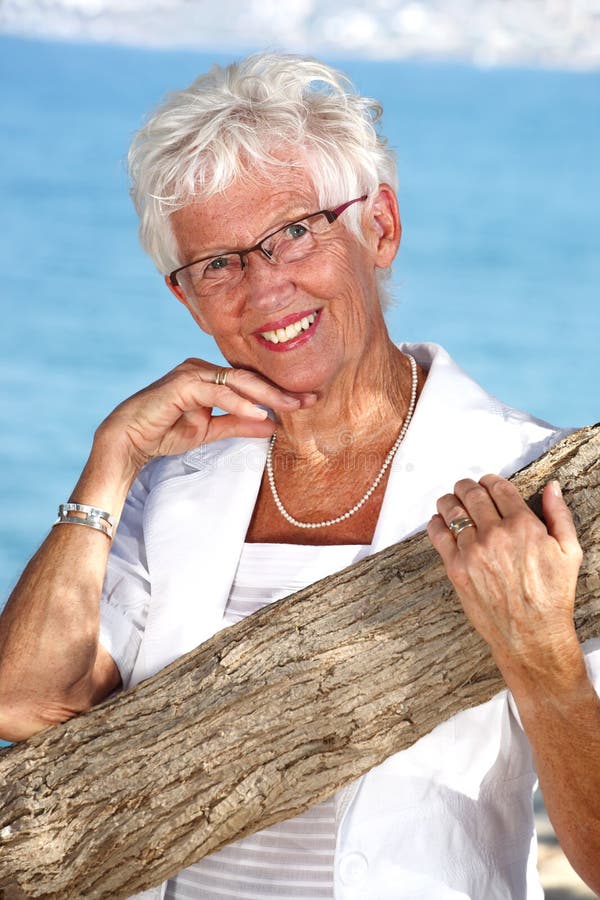 Radiant Senior Lady Outdoors Stock Photo - Image of cordial, alone: 7795490