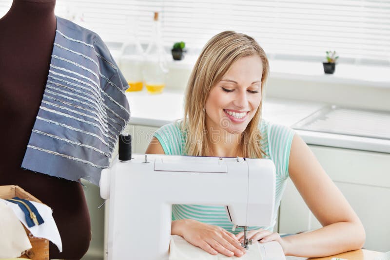 Radiant Woman Sewing Clothes at Home Stock Image - Image of sample ...