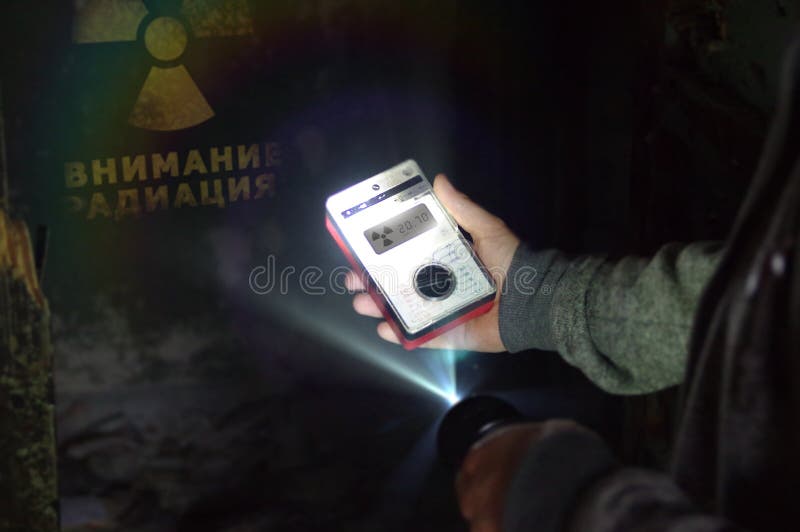 Radiation meter in hand stock photo. Image of radiation - 152058568