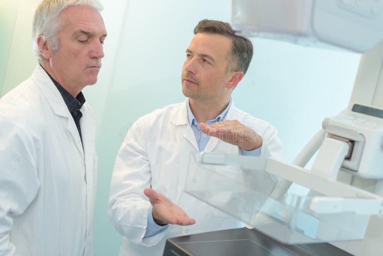 Radiation Technologist Explaining Feature Machine Stock Photo - Image ...