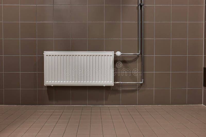 Radiator in a Bathroom with Tiles Stock Image - Image of heat, tiling ...