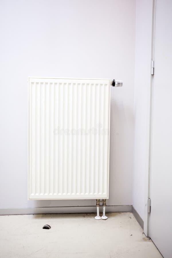 Radiator on the wall stock photo. Image of object, home - 85491504