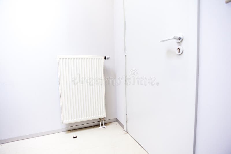 Radiator on the wall stock image. Image of temperature - 85491545