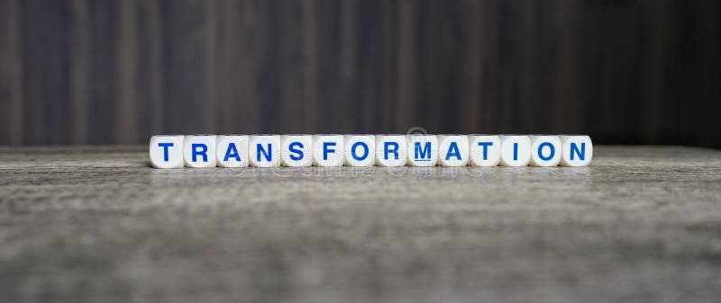 Transformation Boggle Word Cubes on Dark Background Stock Image - Image ...