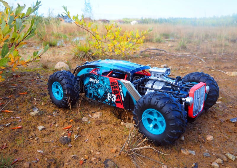 A Radio-controlled Car with a Remote Control. Close-up and Details of a ...