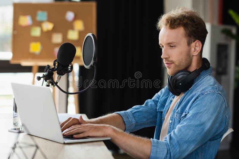 Radio Host in Headphones Using Laptop Stock Image - Image of beverage ...