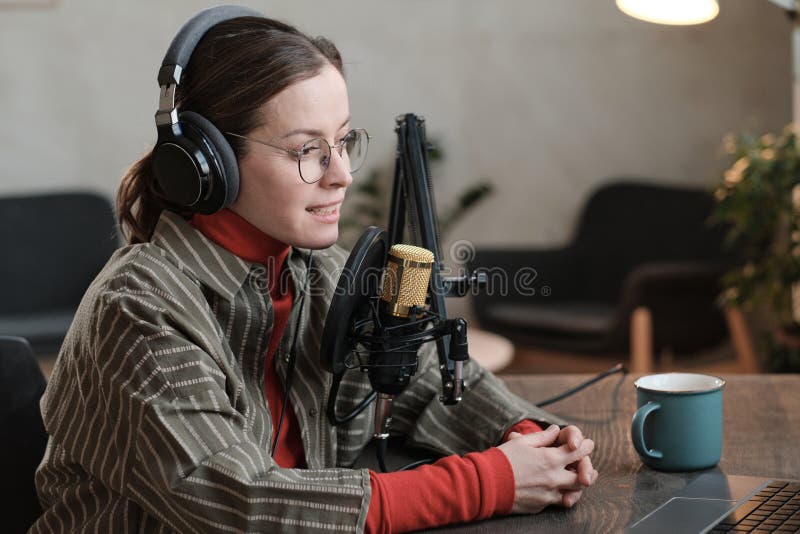 Radio host at work stock image. Image of headphones - 214643793