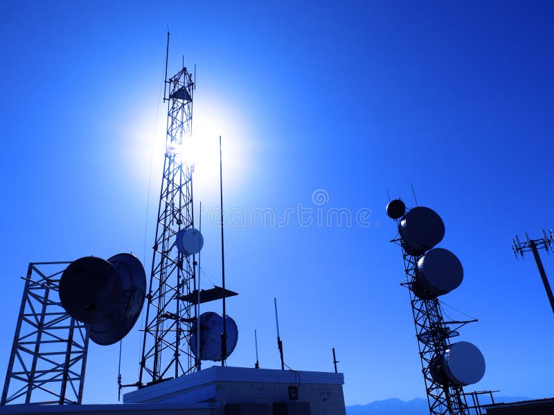 Radio Towers for Transmissions Satellites with Blue Sky and Sun Stock ...