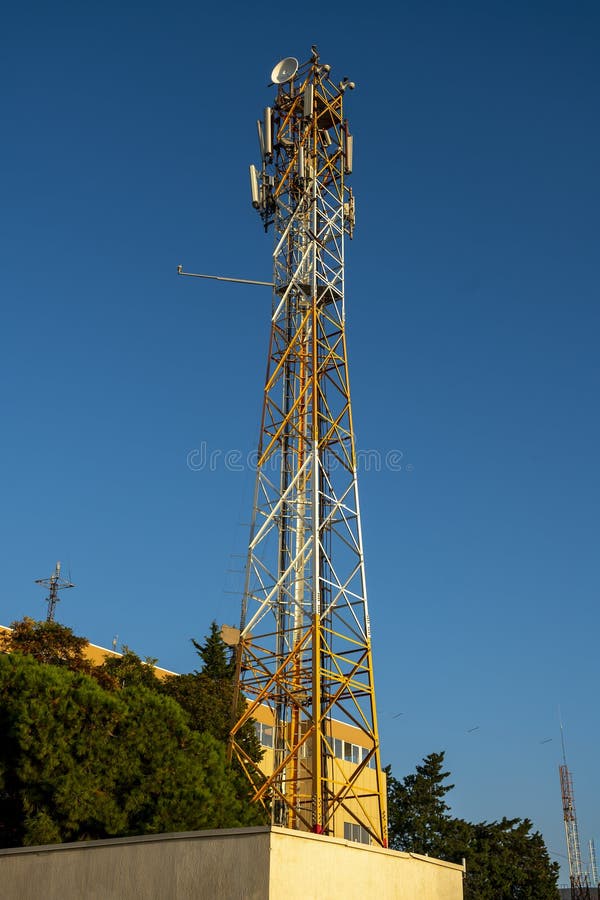 Radio Transmitting TV Tower with Transmitters Against the Blue Sky ...