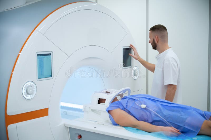 Technologist Positioning Outpatient for Magnetic Resonance Imaging of ...