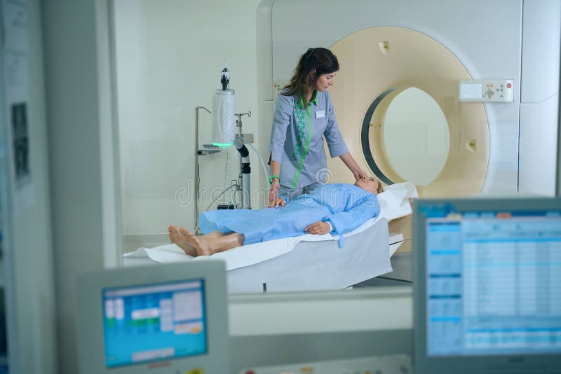 Experienced Radiologic Technologist is Preparing Client for Computed ...