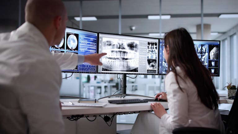 Radiologist Doctors Analyzing Brain MRI Scan Stock Photo - Image of ...