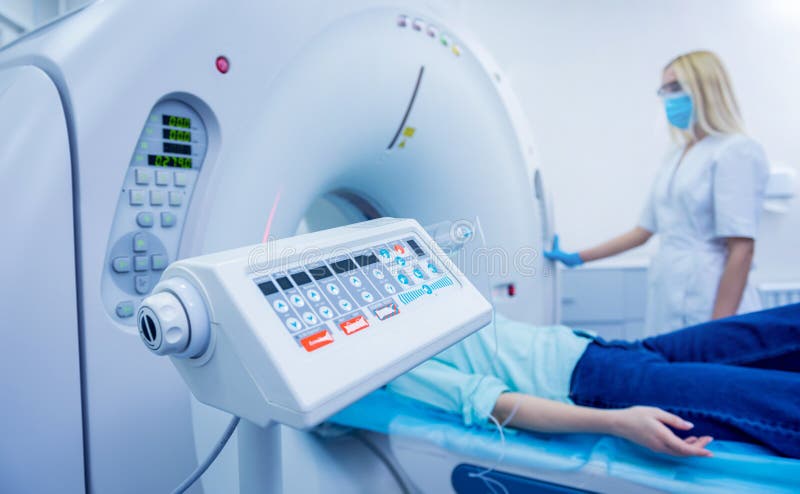 Radiologist with a Female Patient in the Room of Computed Tomography ...