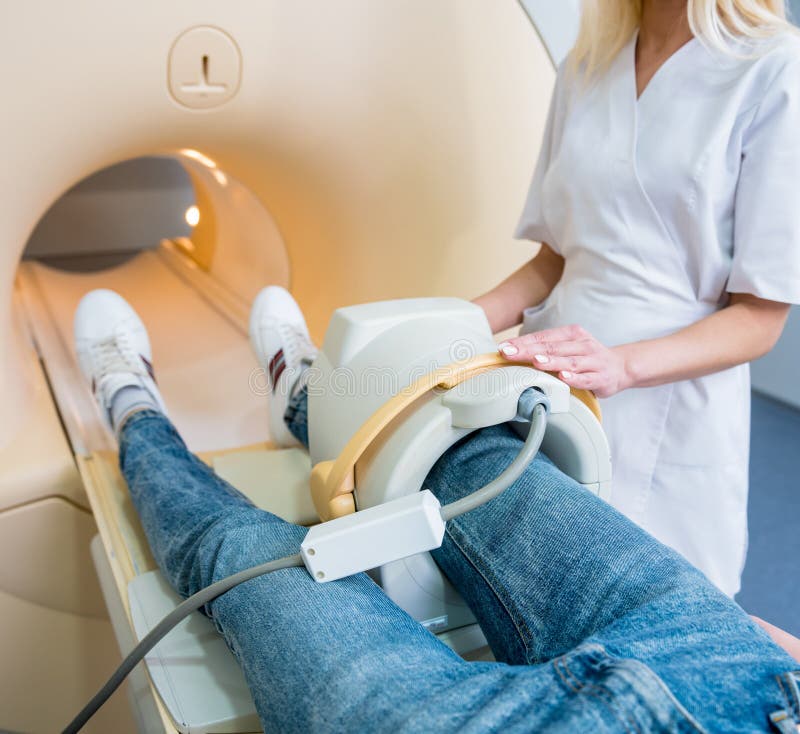 Radiologist Prepares the Patient for an MRI Knee Examination Stock ...