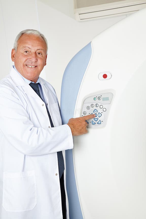 Radiologist Pressing Button on MRI Stock Image - Image of senior ...