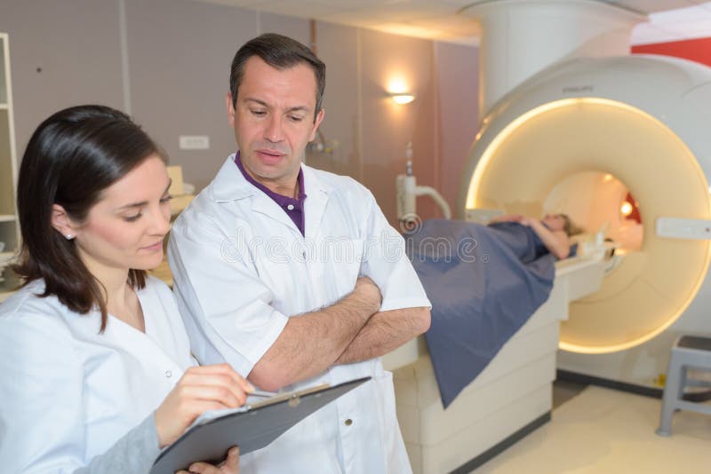 Radiologists in Discussing Results by Mri Machine Stock Image - Image ...