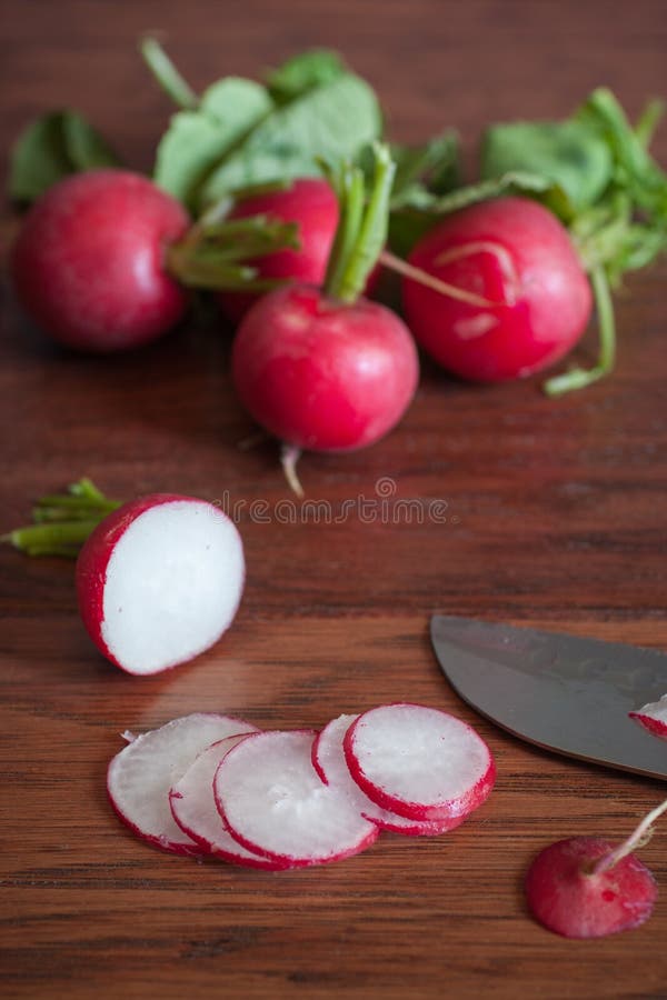 Radishes on a Cutting Board Stock Image - Image of cutting, radish ...