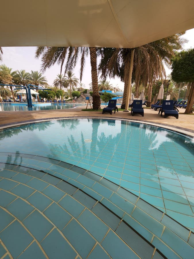 Radisson Blu Al Ain pools editorial photo. Image of walkway - 250380116