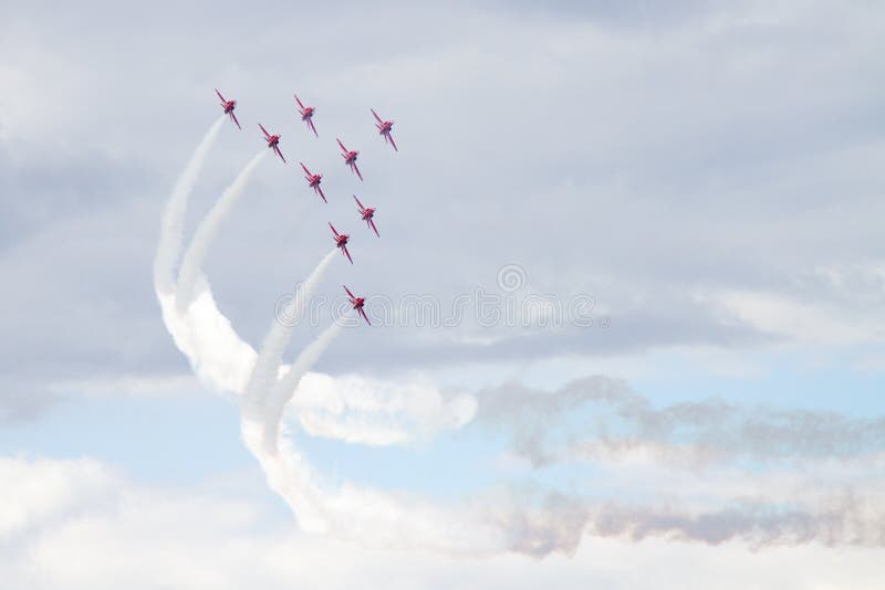 RAF Red Arrow Display editorial stock image. Image of arrow - 186391244