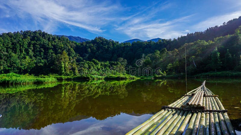 Raft Made of Bamboo on a Lake Stock Photo - Image of mountain, lake ...