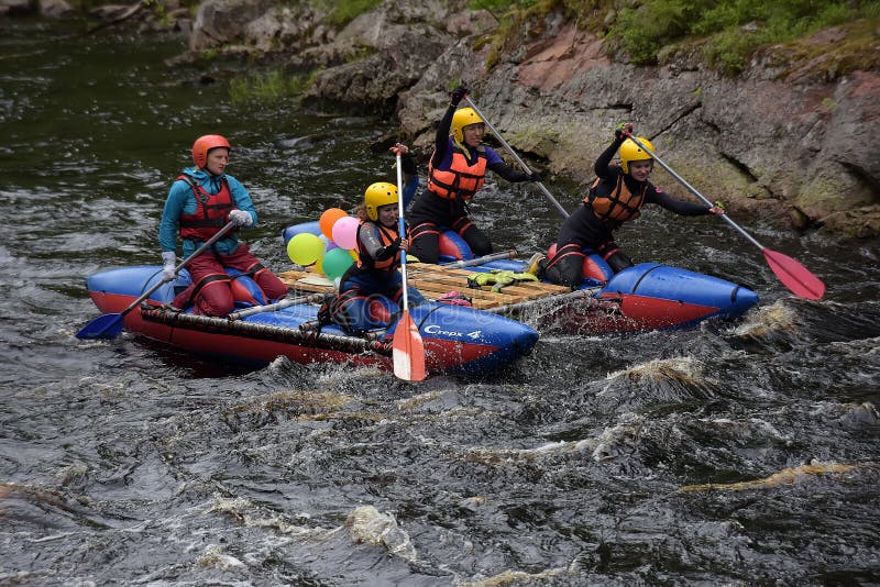 Two Men on a Makeshift Catamaran Raft on the Northern River. Stock ...