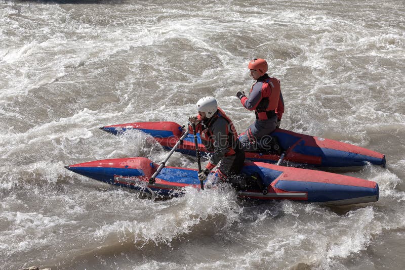 Rafting, Brave and Courageous People Conquer Water Obstacles on a ...