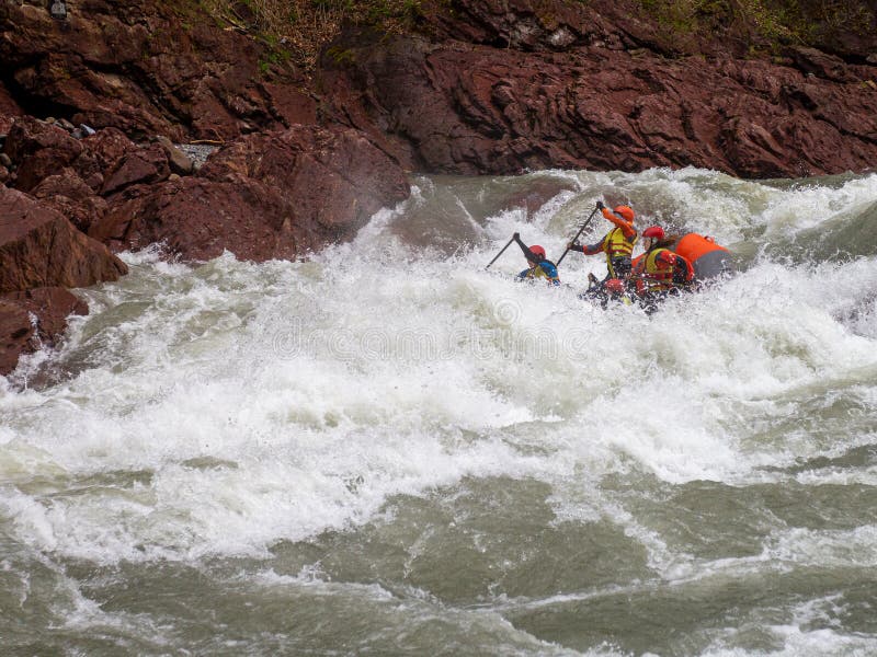 Rafting, Brave and Courageous People Conquer Water Obstacles on a ...