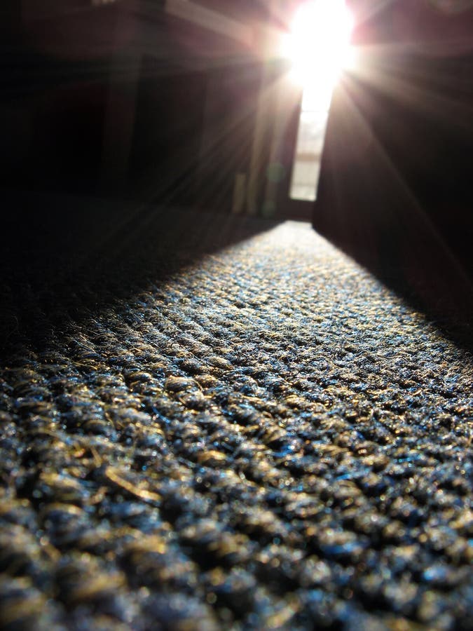 Raggio di sole sul tappeto fotografia stock. Immagine di macro - 1350724
