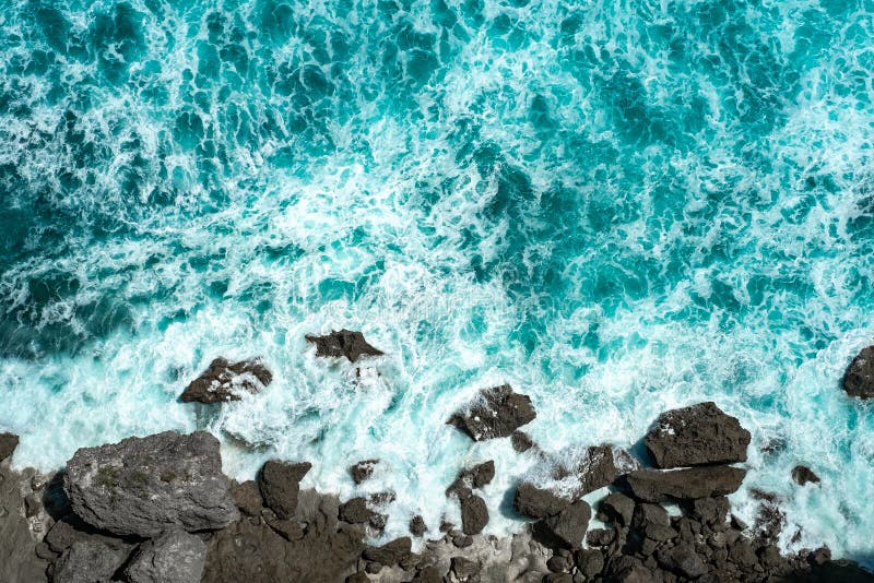 Raging Blue Ocean Waves Break on Rocks Stock Photo - Image of rocky ...