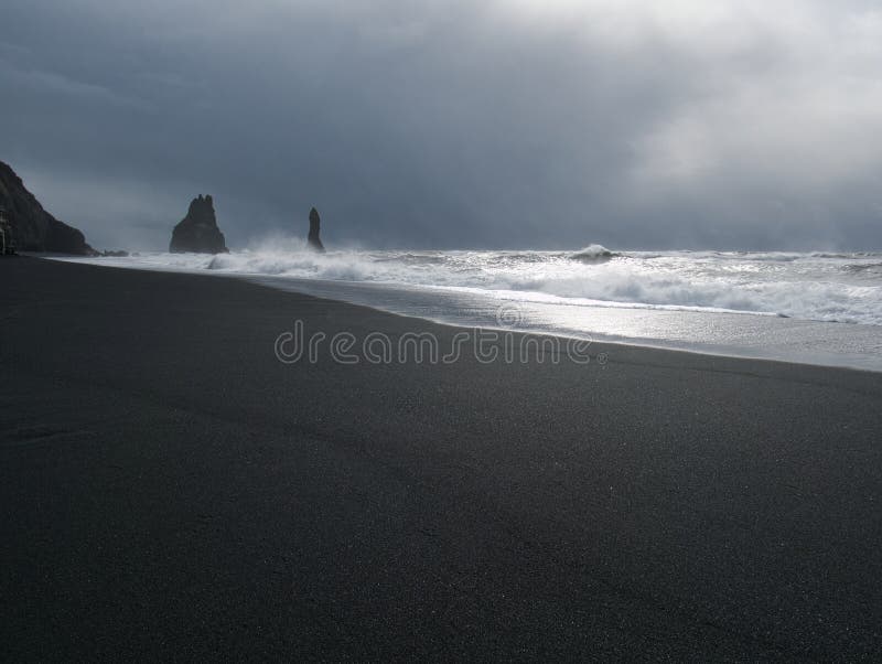 Raging Sea and the Rocks on the Black Beach Stock Image - Image of surf ...