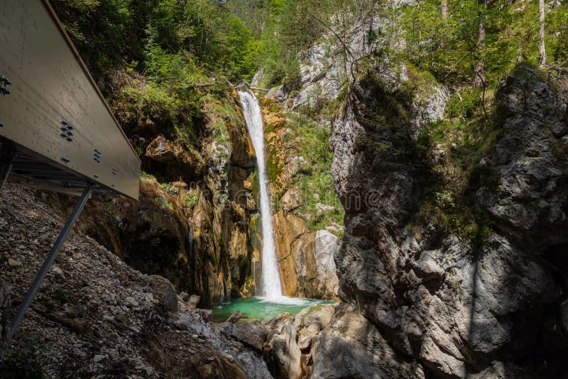 Raging Waterfall Surrounded with Rocks and Trees Stock Photo - Image of ...