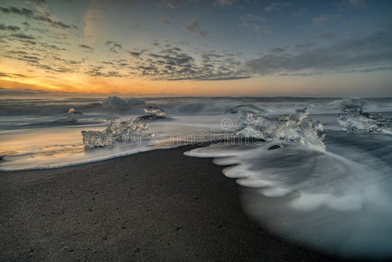 Raging Waves Smashing Ice Blocks at Sunrise on Diamond Beach Stock ...