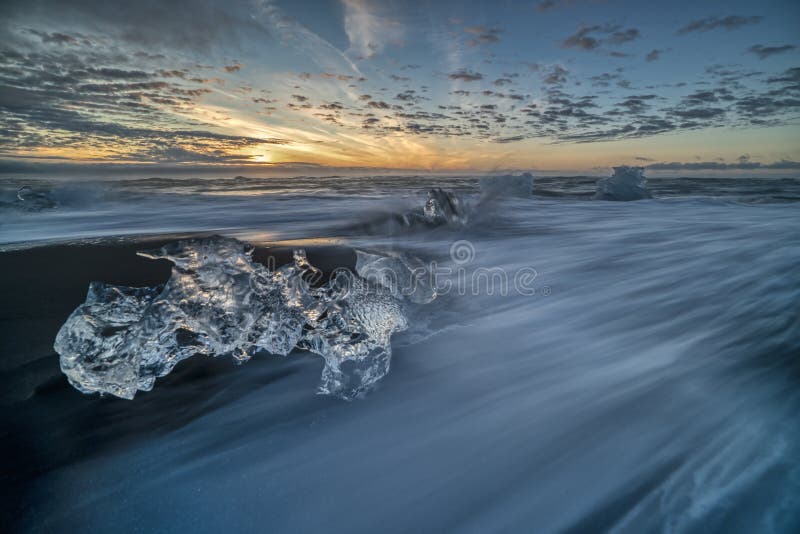 Raging Waves Smashing Ice Blocks at Sunrise on Diamond Beach Stock ...