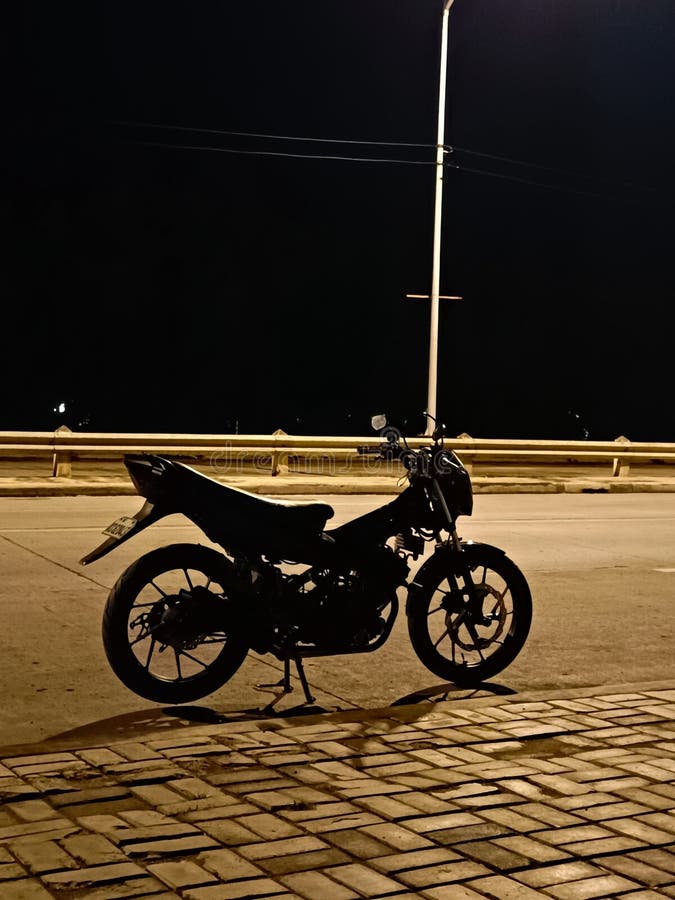 Raider Carb Night Ride Black Stock Image - Image of raider, black ...