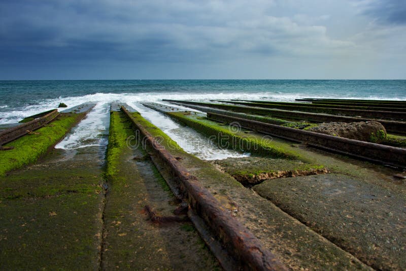 Rail going into water stock image. Image of seafront - 27205425