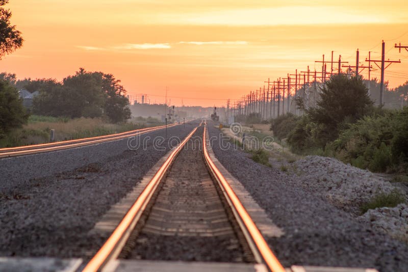 Rail Road Crossing and Tracks at Sunset Stock Photo - Image of light ...