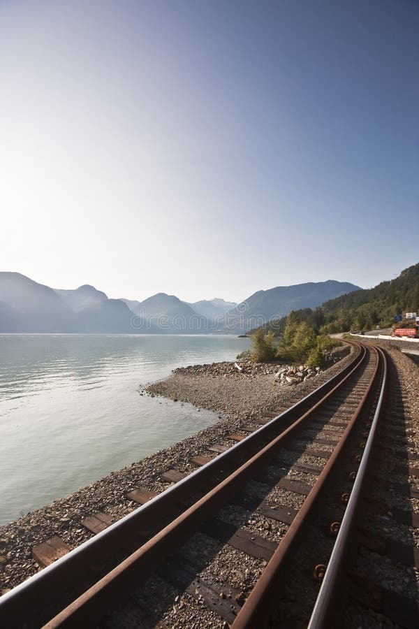 Rail road tracks stock photo. Image of boulders, cloudy - 13051796