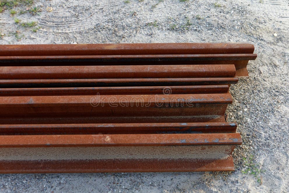 Rail Sections on the Ground Stock Image - Image of rails, stacked ...