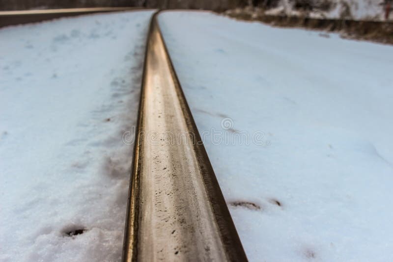 Rail in the Snow stock photo. Image of steel, track, rail - 48924790