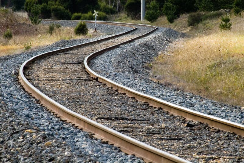 Rail track stock photo. Image of stones, curve, rust, grass - 2658482