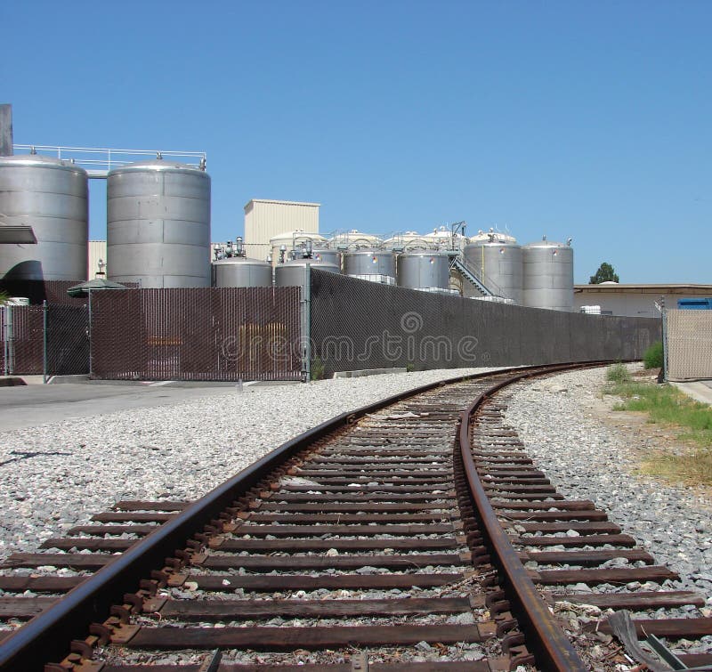Rail Tracks Leading To Industrial Plant Stock Image - Image of fence ...