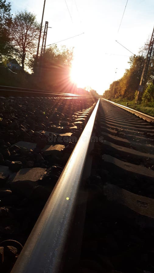 Rail tracks in sunset stock photo. Image of train, sunset - 126898826