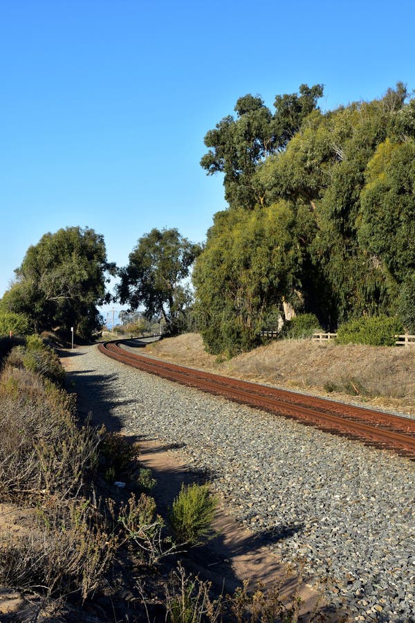 Rail Tracks Winding Around a Corner Stock Photo - Image of destination ...