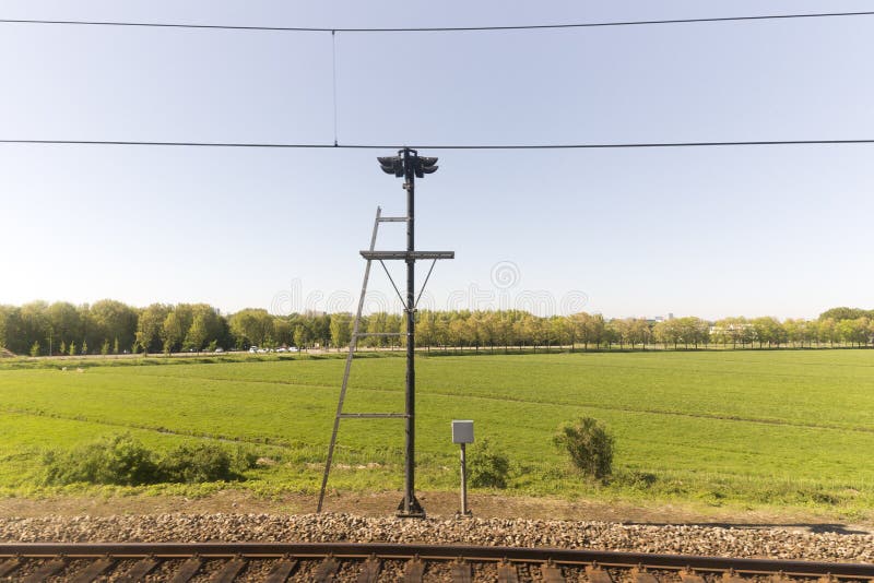 Rail Transportation Stopping Light Next To Agricultural Landscape Stock ...