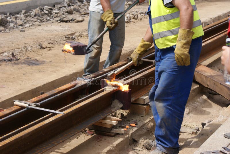 Rail workers at the work stock image. Image of merge - 77667279
